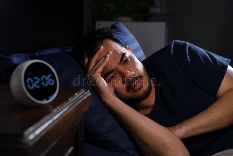 Depressed Young Asian Man Lying in Bed Cannot Sleep from Insomnia ... Depressed Young Asian Man Lying in Bed Cannot Sleep from Insomnia ...