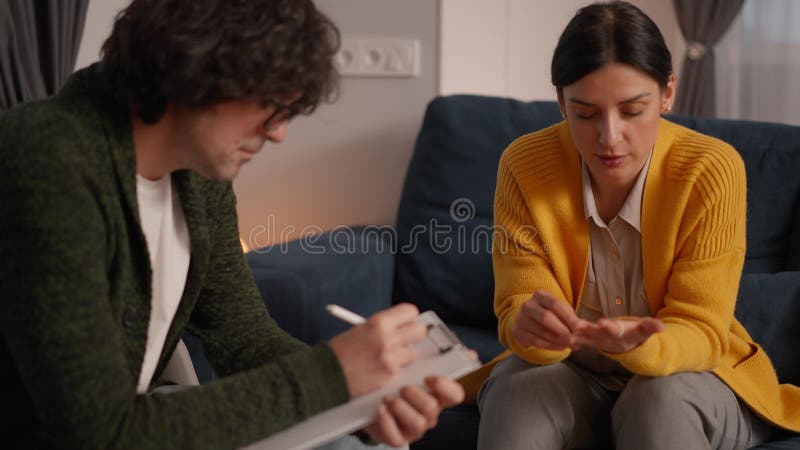 Depressed Young Woman Talking about Problems Sitting on Comfortable ...