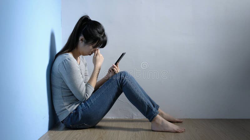 Sad Teen Checking Phone at Home Stock Image - Image of concerned ...