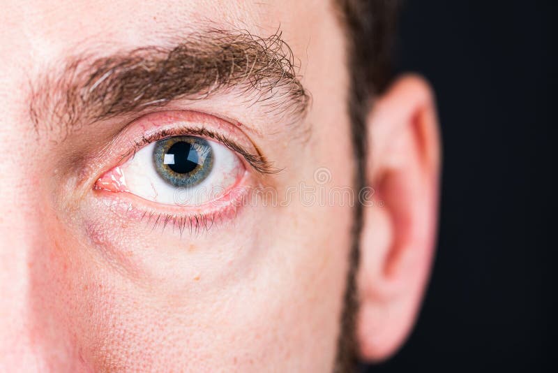 Depth of Field - Focus on Eye of Man with Unsharped Ear on the Black ...