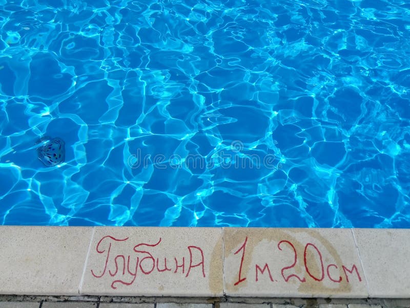 The Depth of the Pool is 1 Meter 20 Centimeters. Clear Blue Water Stock ...