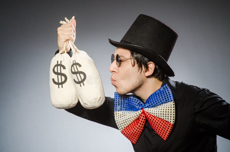 Der Lustige Mann Mit Gelddollarsäcken Stockfoto - Bild von lustig ...