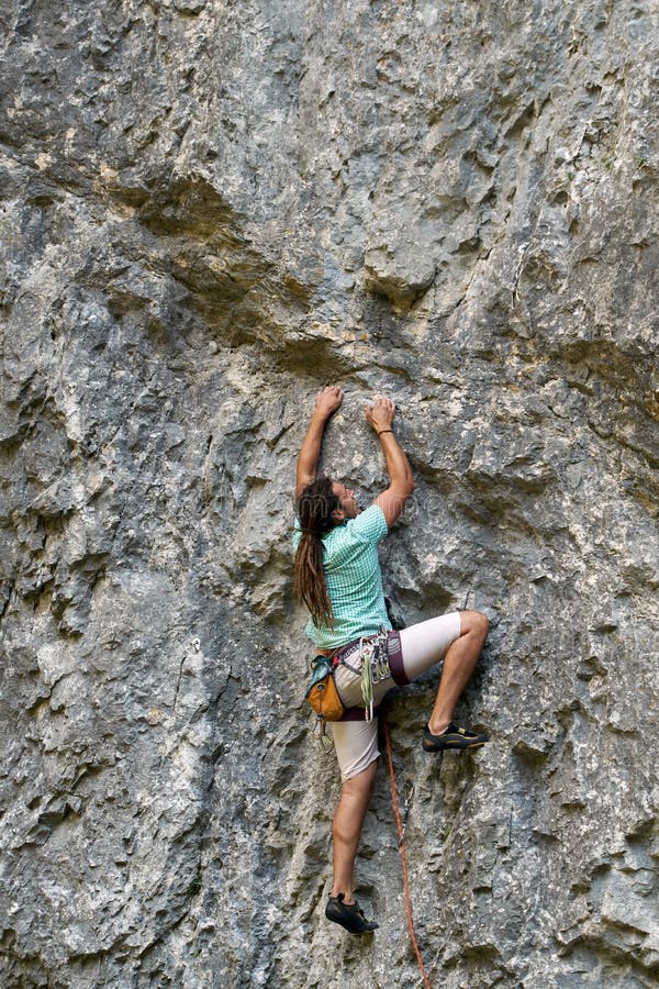 An der Wand klettern stockfoto. Bild von person, bergsteiger - 162280404