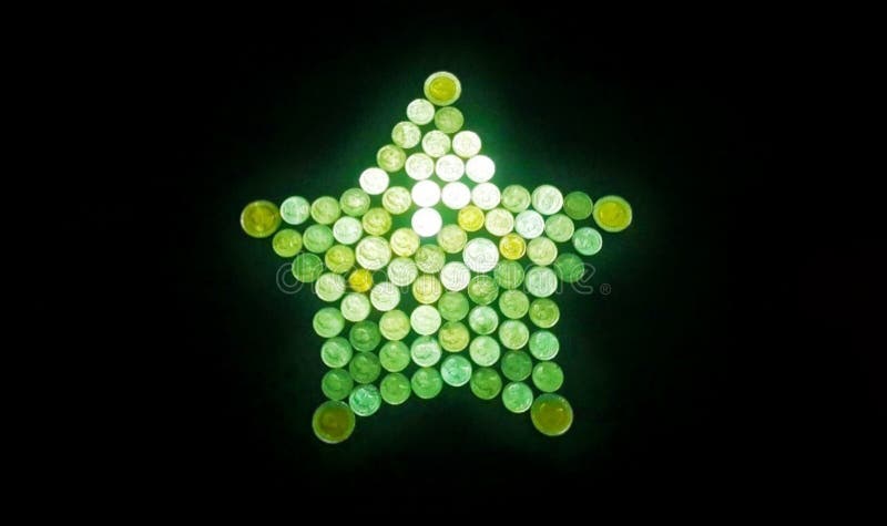 Shining Star Shaped Coin on Black Background Stock Photo - Image of ...
