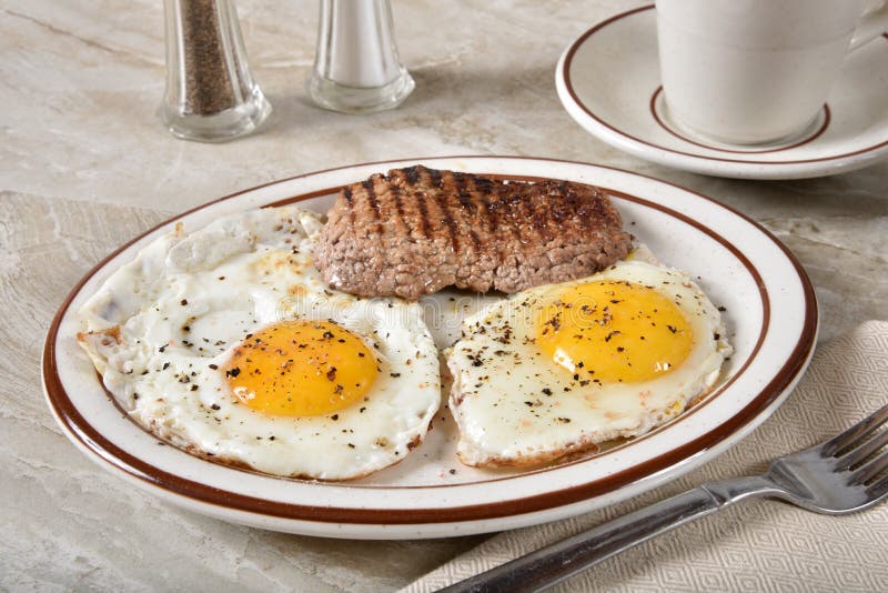 Desayuno Del Filete Y Del Huevo Imagen de archivo - Imagen de taza ...