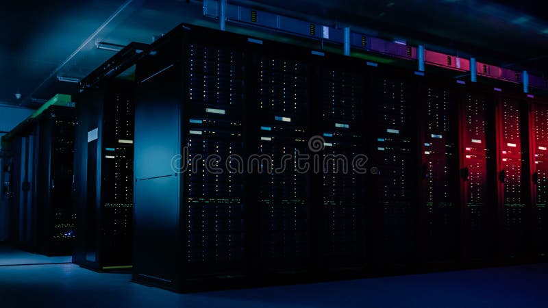 Descending Shot of Data Center with Multiple Rows of Fully Operational ...
