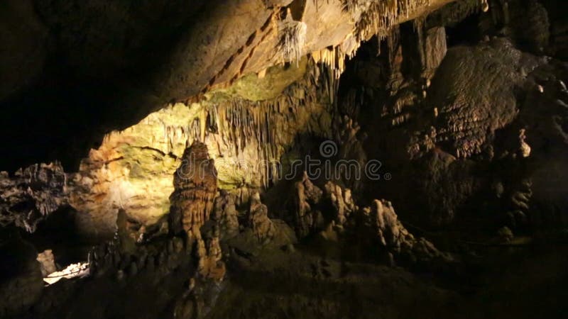 Descent into Underground Cave with Stalactites and Stock Footage ...