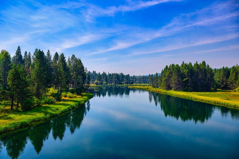 The Deschutes River Running through Sunriver Oregon with a Beautiful ...