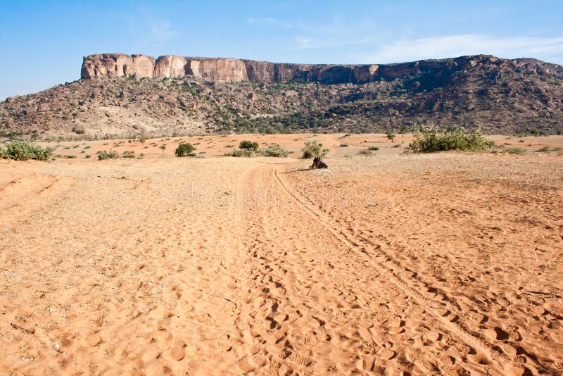 Desert at the Base of the Cliff, Mali (Africa) Stock Image - Image of ...