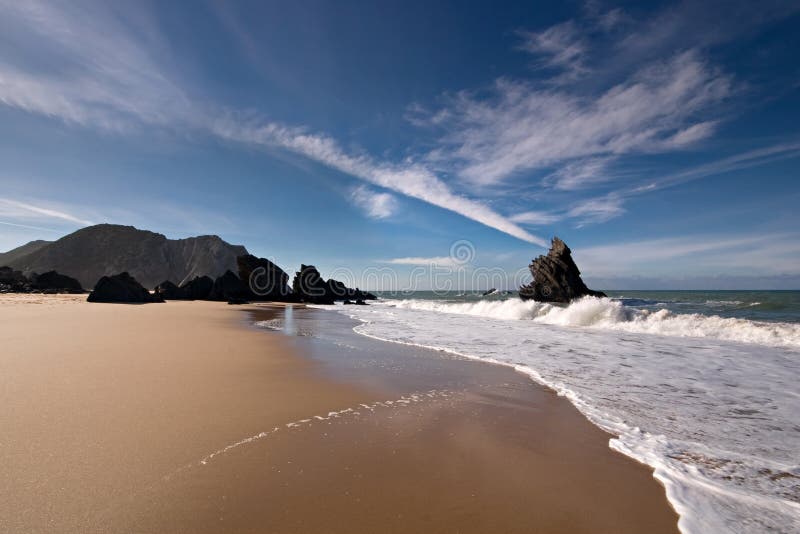 Adraga beach at sunset stock photo. Image of coastline - 3993924