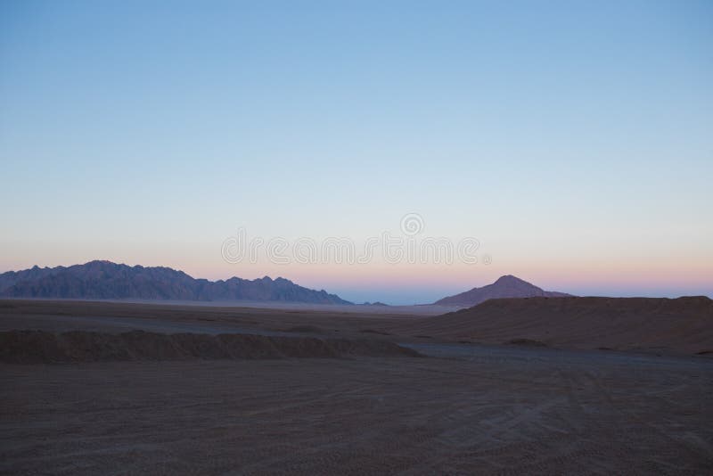 The Desert of Egypt in the Setting Sun, Mountains and Sand Stock Image ...