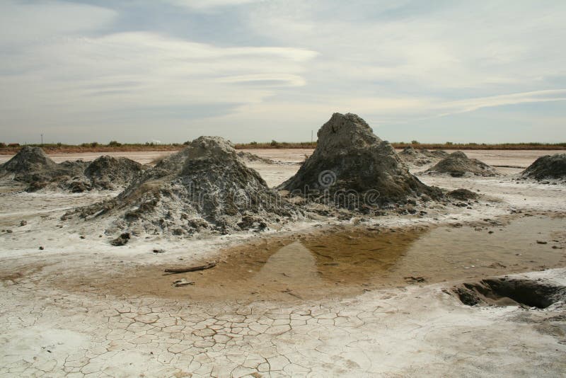 Desert mud pots stock image. Image of mineral, hills - 27112965