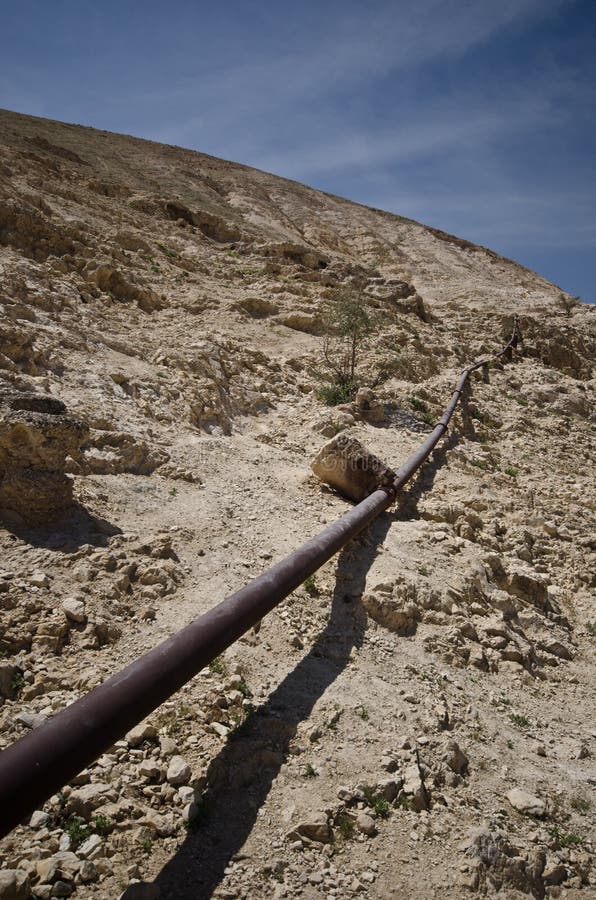 Oil pipeline in the desert stock photo. Image of pipe - 36466642