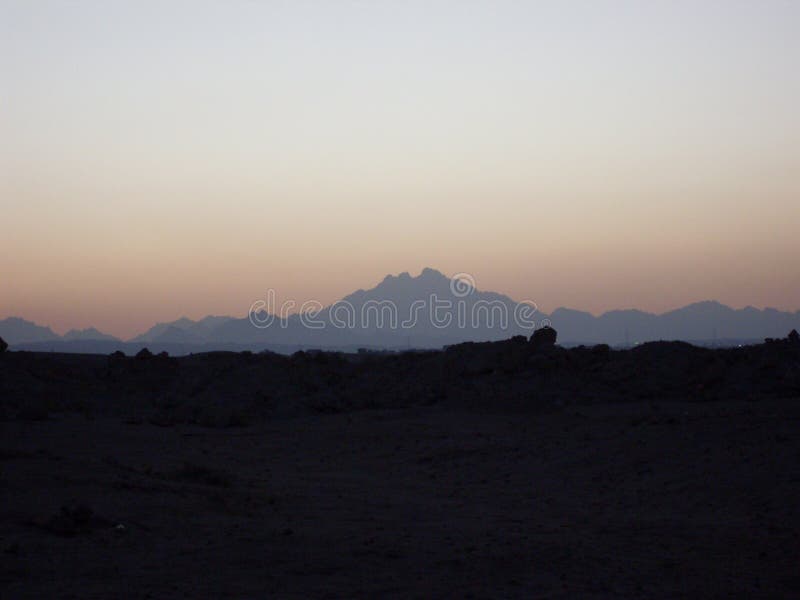 Desert in the Sunset and Big Mountain on the Horizon Stock Photo ...