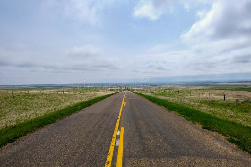 The Prairie Road Leads To the Horizon. Stock Photo - Image of blue ...