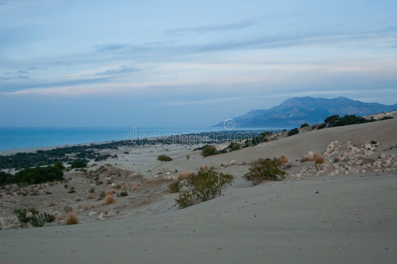 Deserted Sandy Beach with Clean Fine Sand at Sunrise Stock Photo ...