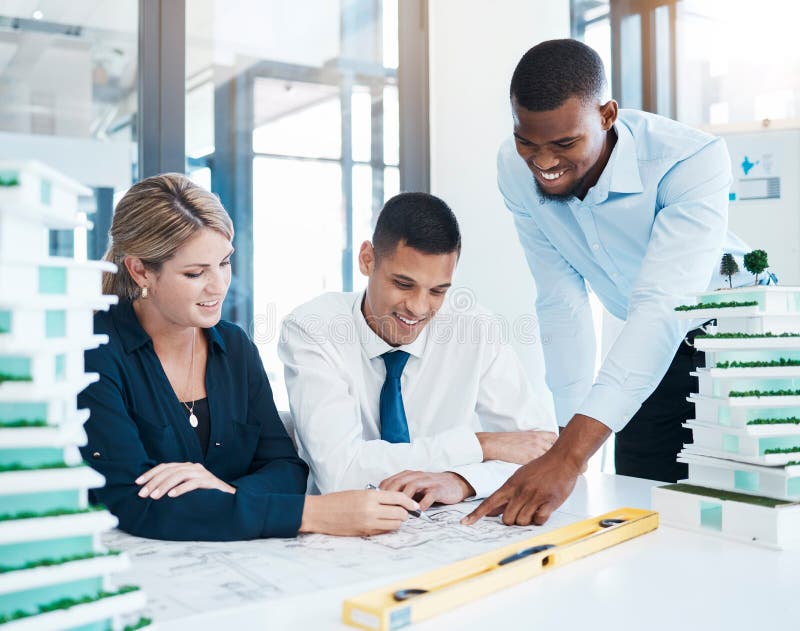 Team of Architects Working on Construction Plans. Stock Image - Image ...