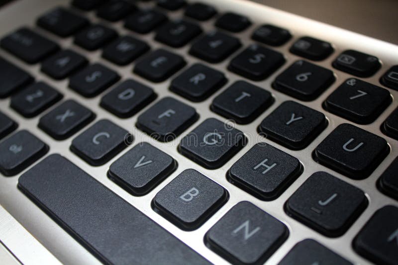 The Design of a Certain Brand of Laptop Keyboard. Stock Image - Image ...