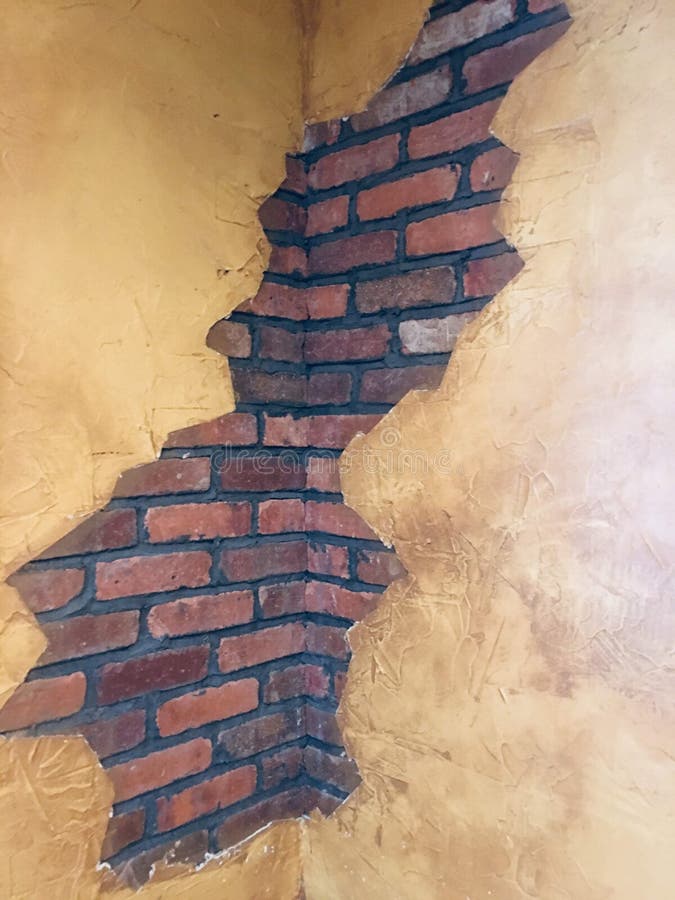 Design Look, Brick Breaking through Plaster Wall Stock Image - Image of ...