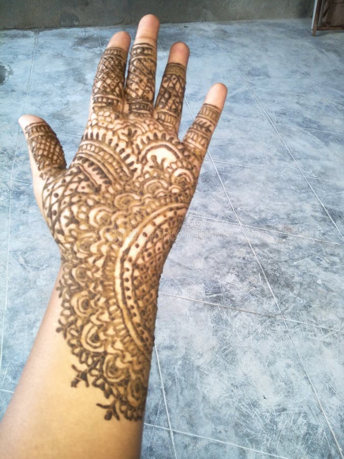 Design of mehandi in hand stock photo. Image of sketch - 194697984
