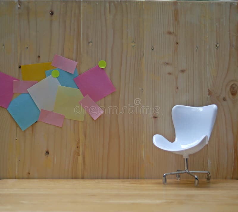 Design Notes and Chairs on a Wooden Wall Stock Image - Image of ...