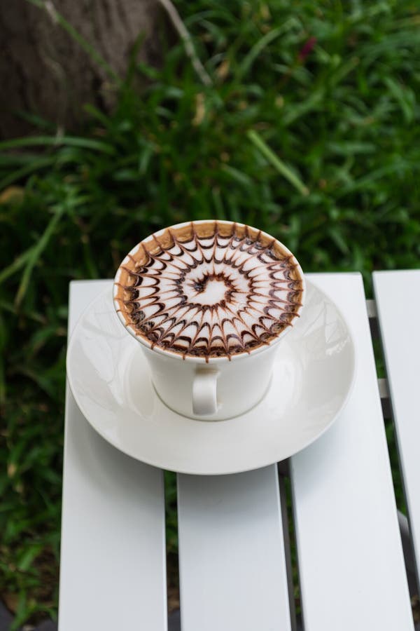 Design Pattern Coffee in a White Cup Stock Image - Image of white ...