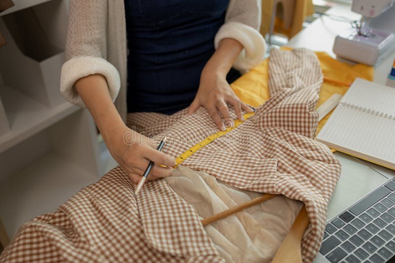 Design Professional Marking on Fabric, Designer Working in the Studio ...