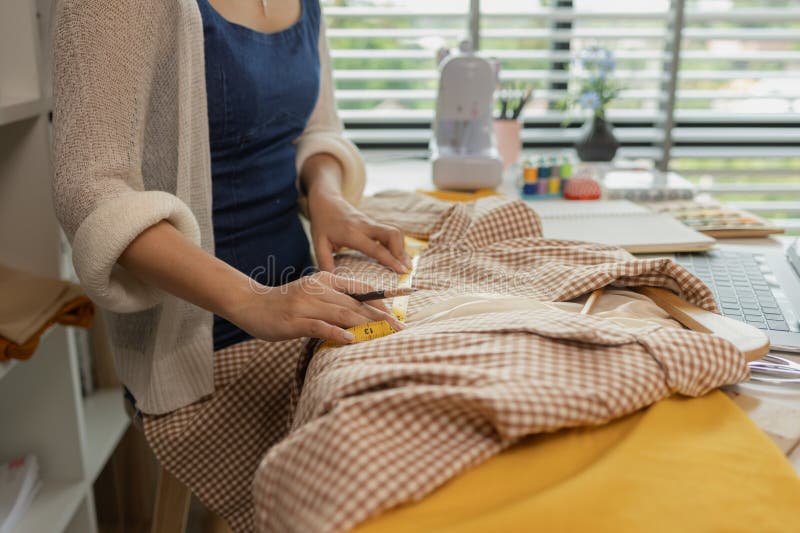 Design Professional Marking on Fabric, Designer Working in the Studio ...