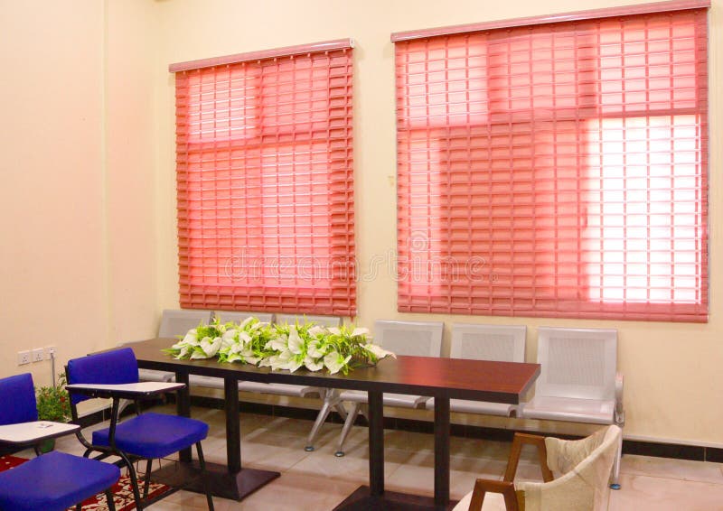 Design of a Room with Two Windows with a Table and Chairs with Roses on ...