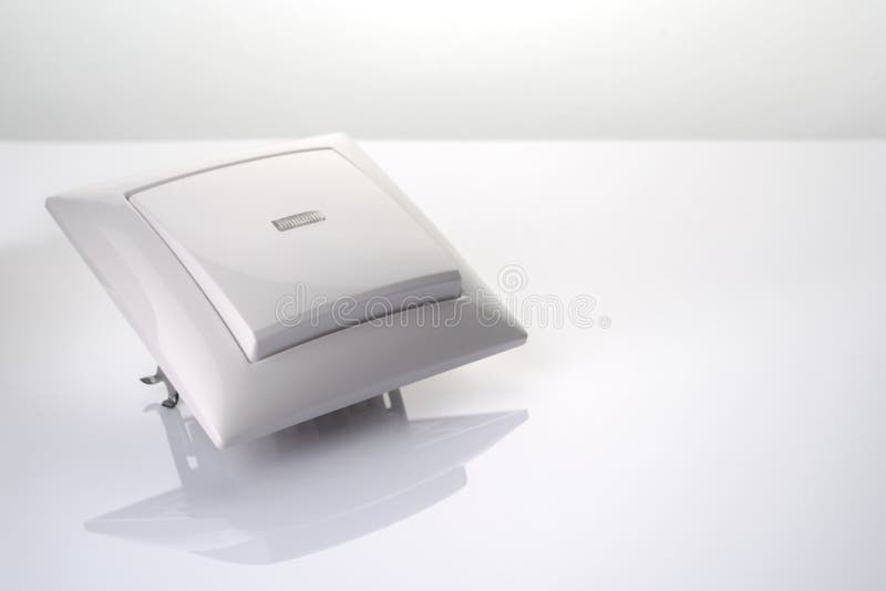 The Design of Square Light Switch on the Glossy Table. Stock Image ...