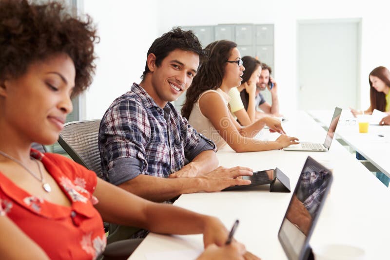 Design Team Collaborating on Project Together Stock Photo - Image of ...