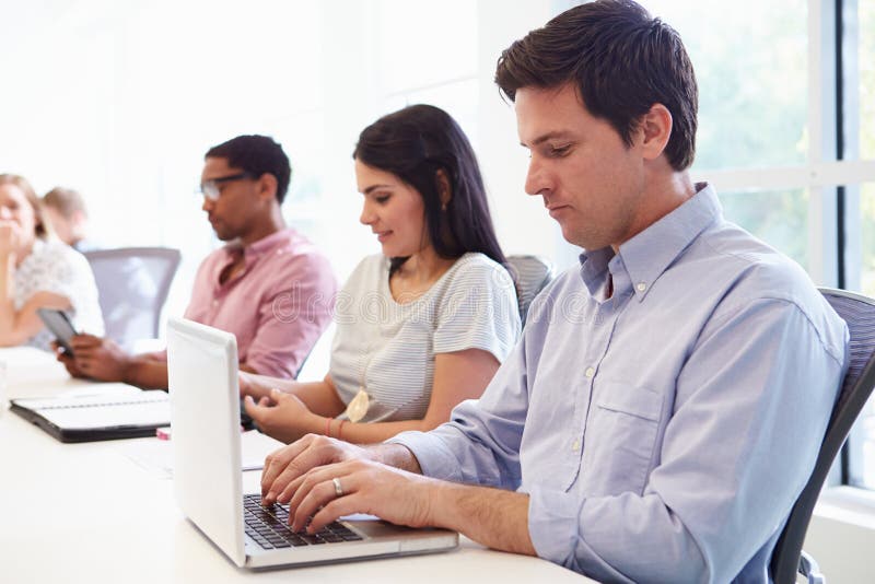 Design Team Collaborating on Project Together Stock Image - Image of ...