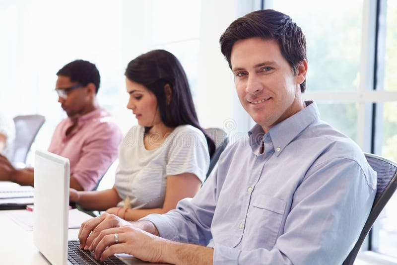 Design Team Collaborating on Project Together Stock Image - Image of ...