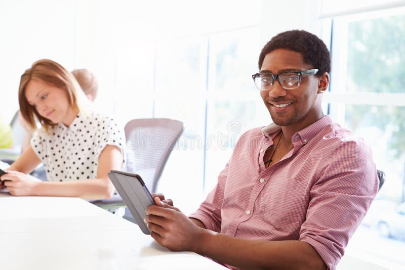 Design Team Collaborating on Project Together Stock Photo - Image of ...