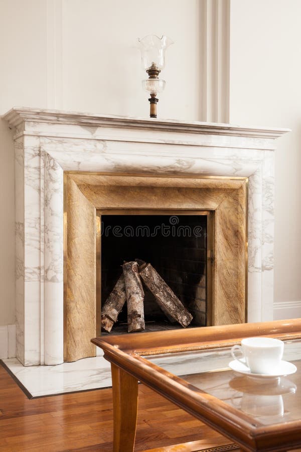 Designed marble fireplace stock image. Image of apartment - 55324453