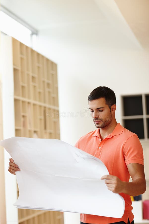 Designer, Architecture and Man with Floor Plan in Office for Blueprint ...
