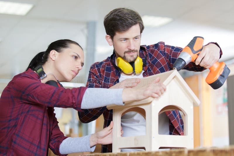 Designer and Builder Working on Project Stock Photo - Image of ...