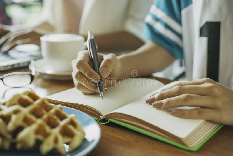 Designer in a cafe stock photo. Image of author, journal - 57570514