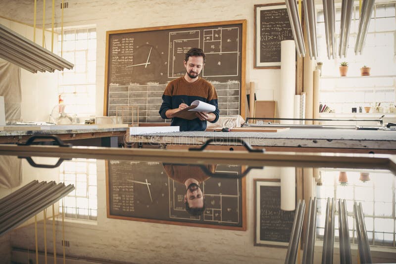 Designer Checking Stock in His Studio Workshop Stock Photo - Image of ...