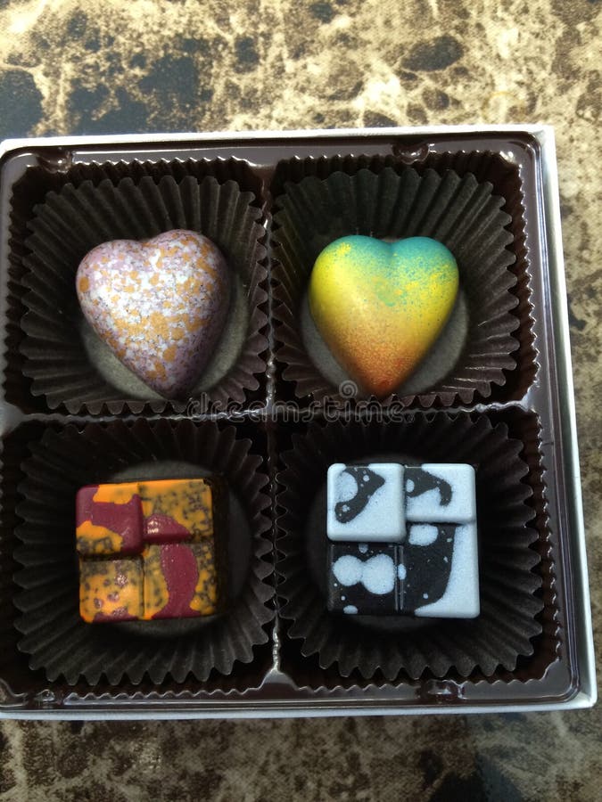 Designer chocolates stock image. Image of dressed, designer - 68941911