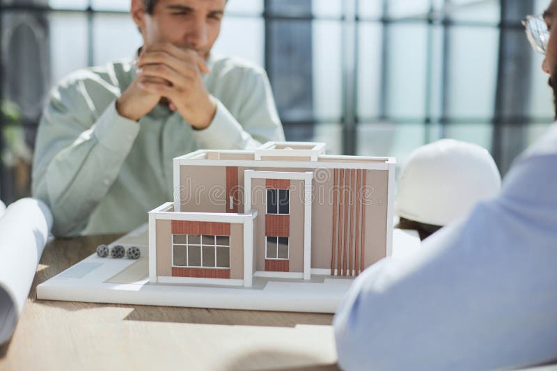 Designer and Client Discuss the Project of a House Under Construction ...