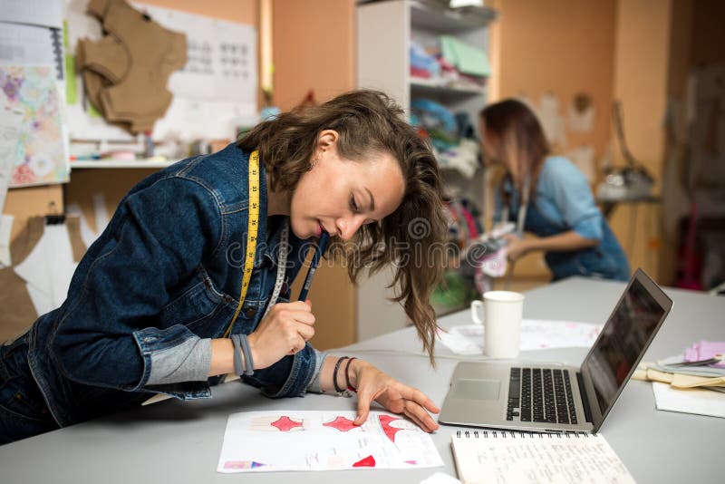 Designer Clothes and Dressmaker, Working in the Workshop Stock Photo ...