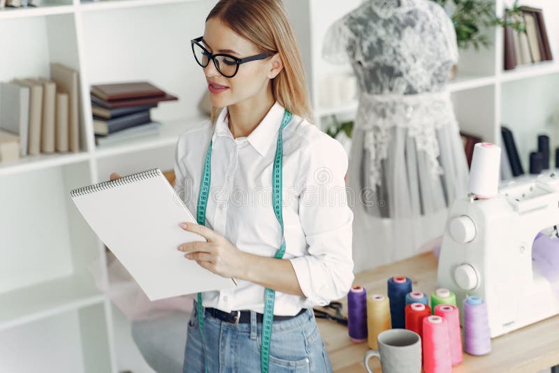 Designer Creates Clothes in Studio Stock Photo - Image of dressmaker ...