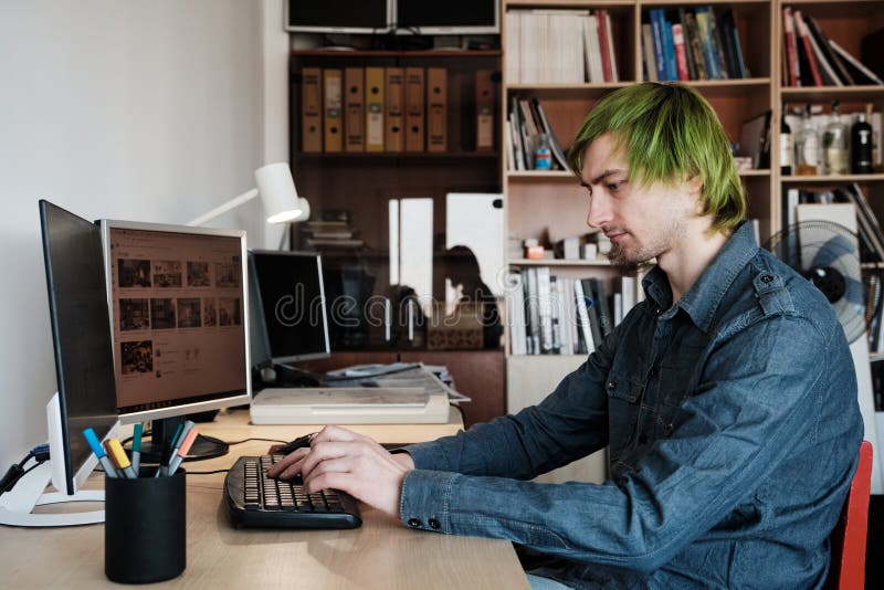 Designer in Denim Shirt Working in Office. Man Working at the Computer ...