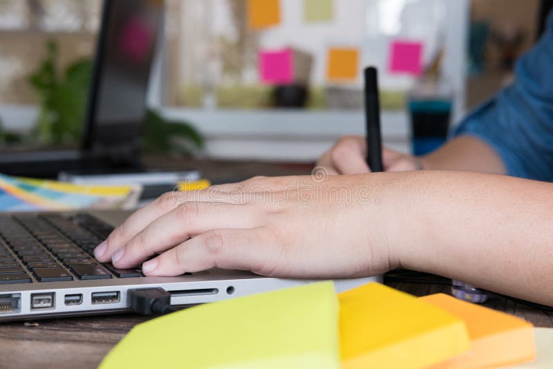 Designer Drawing on Graphic Tablet with Color Sampler Palette at Stock ...