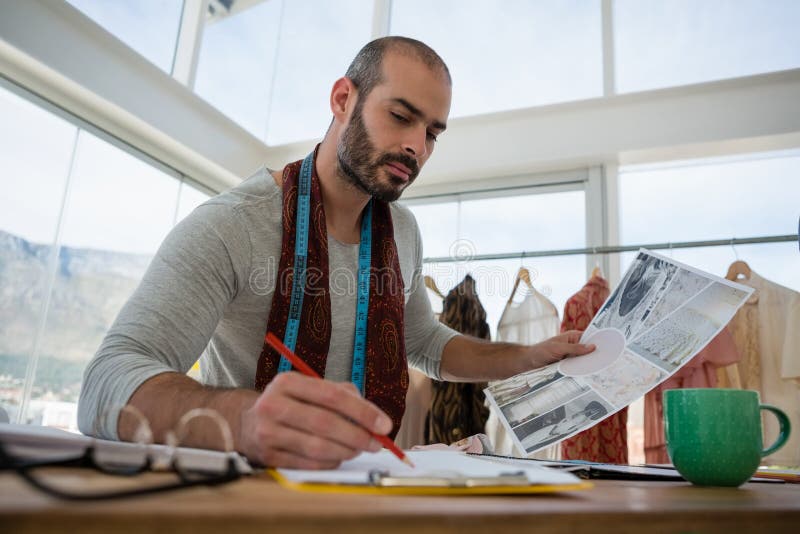 Designer Drawing Sketch in Office Stock Photo - Image of fashionable ...