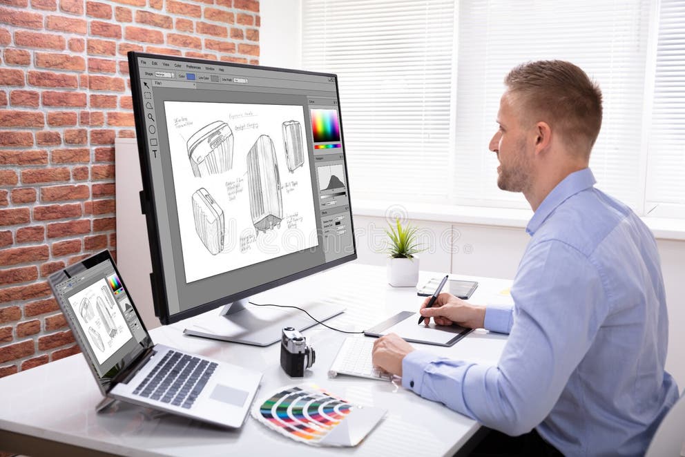 Designer Drawing Suitcase on Computer Using Graphic Tablet Stock Image ...