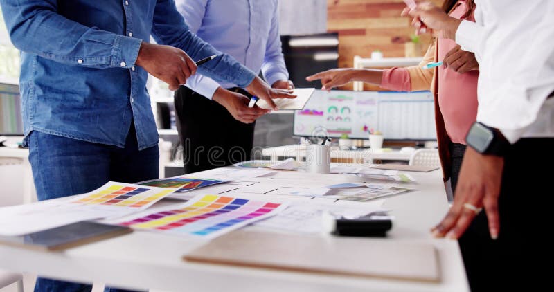 Designer Group at Desk Discussing Custom House Stock Photo - Image of ...