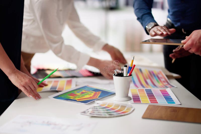 Designer Group at Desk Discussing Custom House Stock Photo - Image of ...