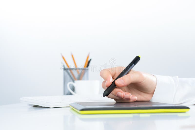 Designer Hand Drawing a Graph on the Tablet Stock Photo - Image of ...